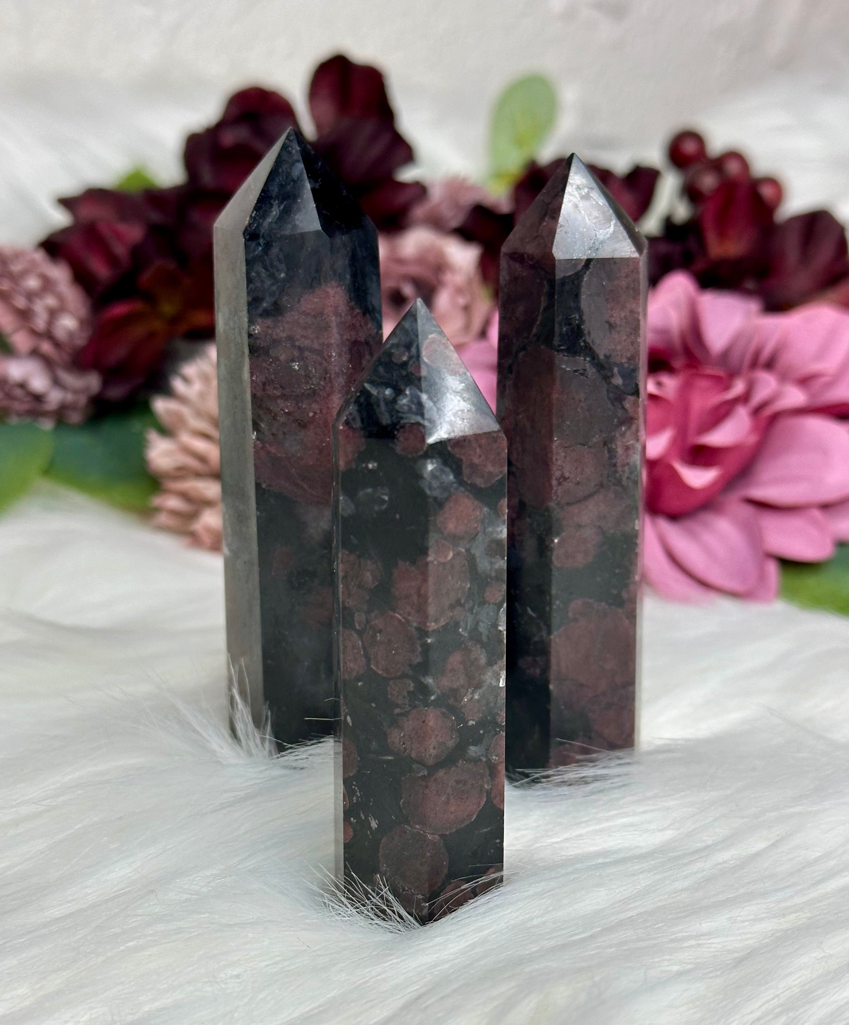 Garnet on Astrophyllite Tower – The Cosmic Exchange